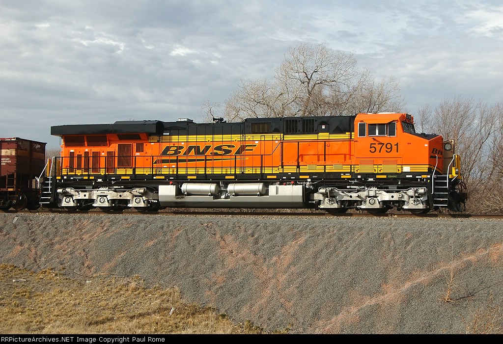 BNSF 5791, ES44AC, is eastbound waiting for a signal